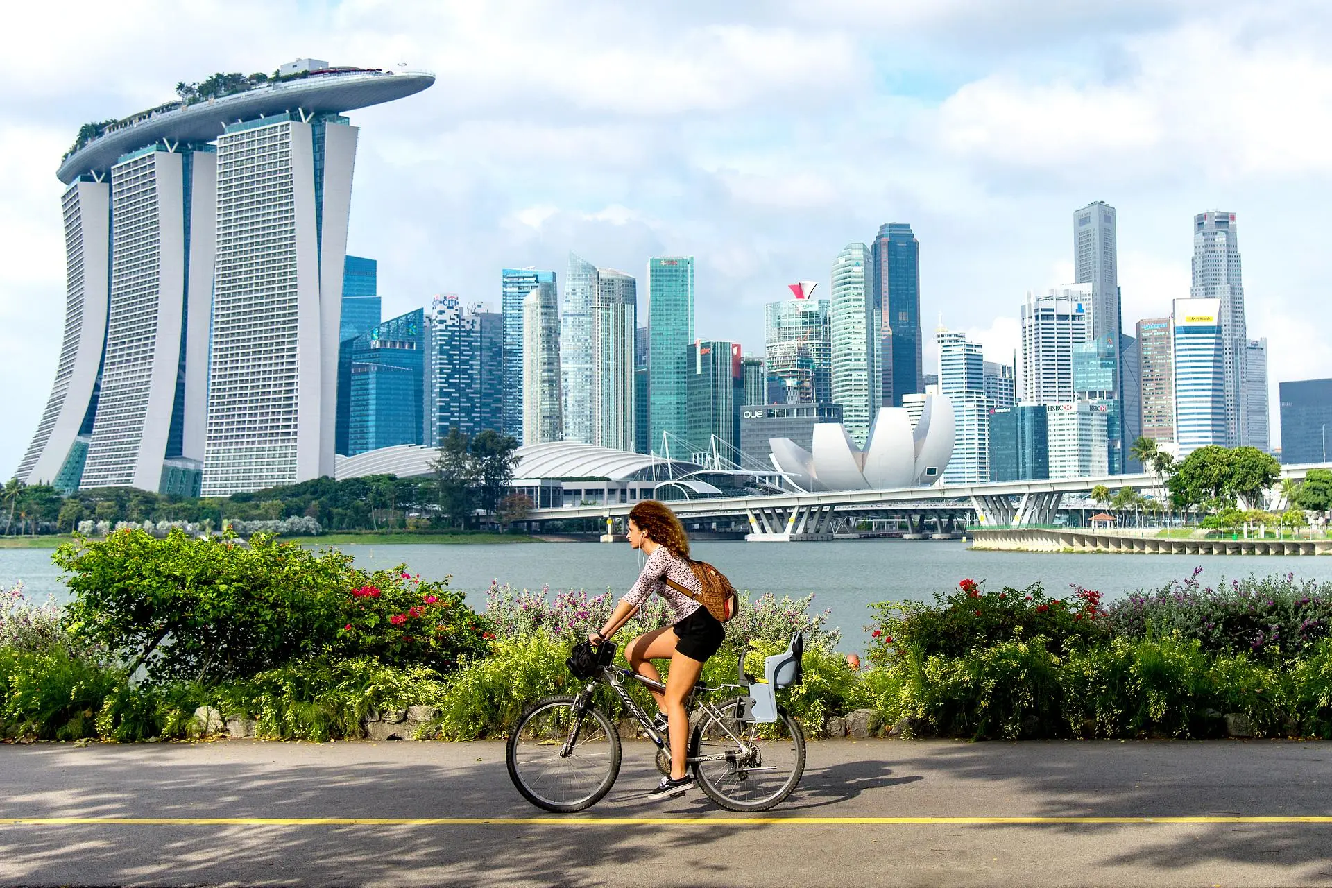 Woman Cycles City Path Skyline, Marina Bay | Singapore Tourism Photos ...